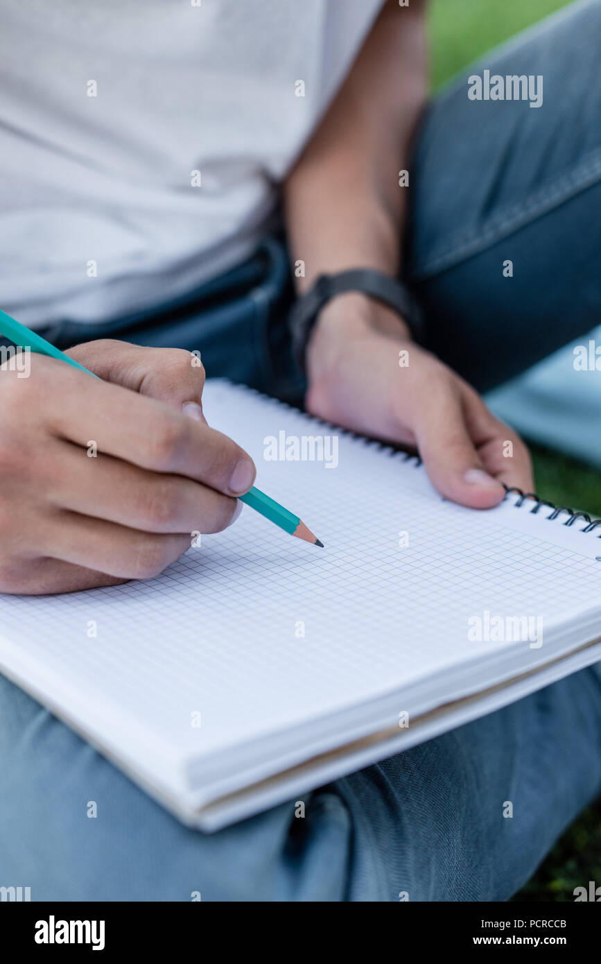 Teenage hands writing hi-res stock photography and images - Alamy