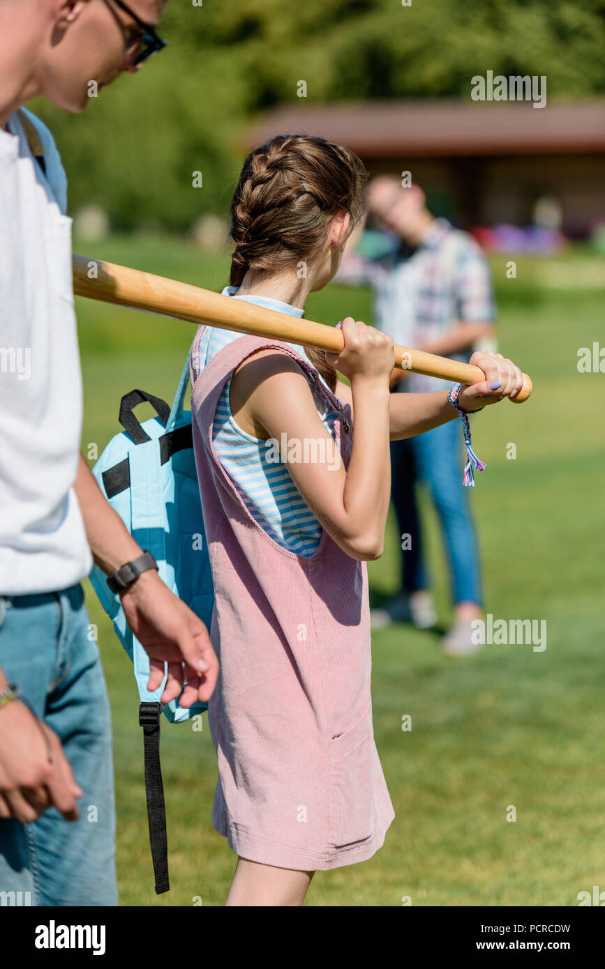 Girl holding baseball bat hi-res stock photography and images - Alamy