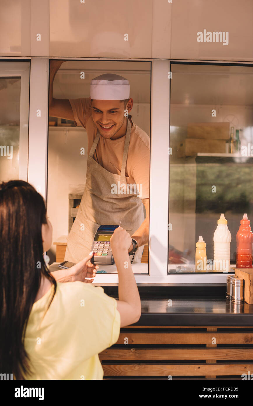 customer paying with credit card at food truck Stock Photo - Alamy