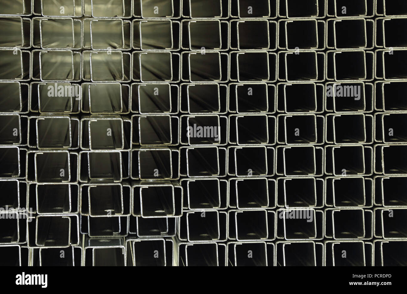 Stainless steel square profiles tubing conduits Stock Photo - Alamy