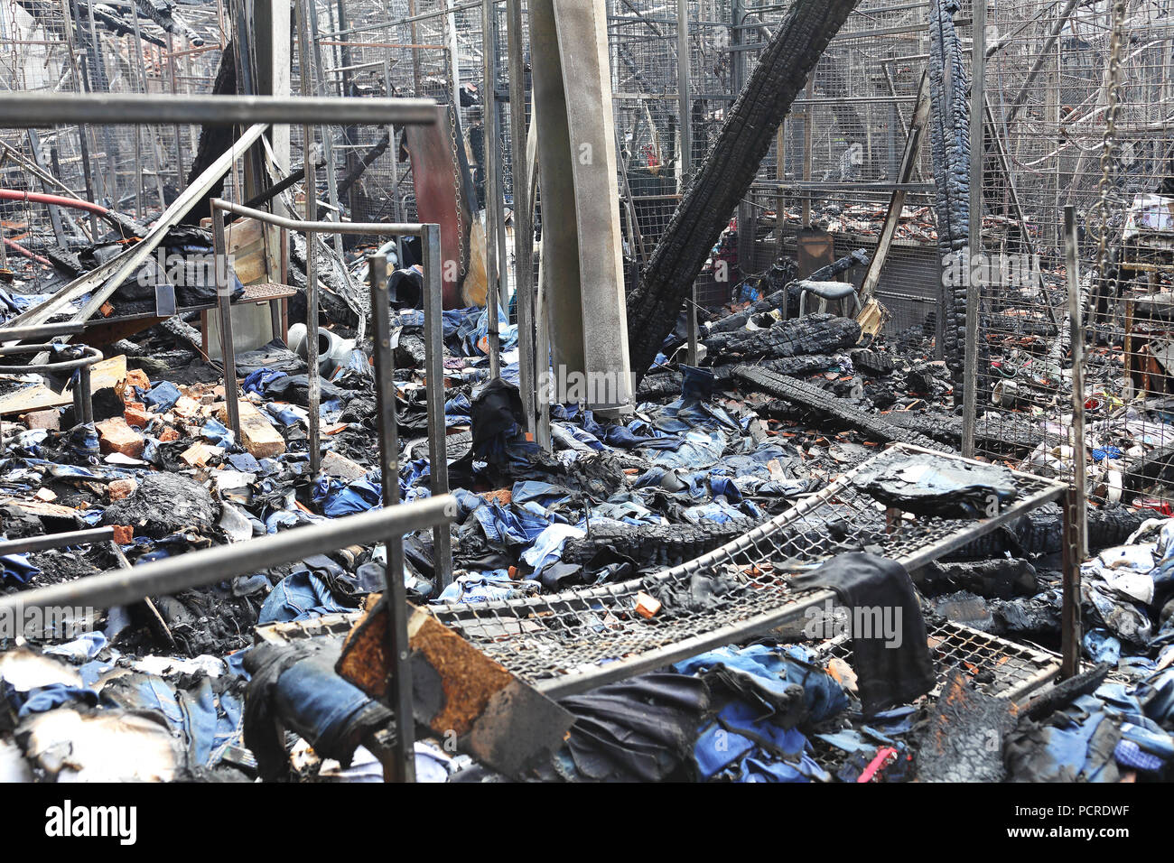 Burned sweatshop garment factory after fire disaster Stock Photo - Alamy