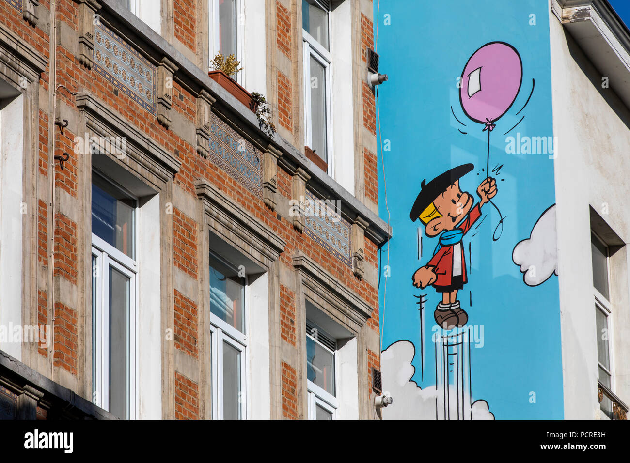 Cartoon mural on a residential building in downtown Brussels Stock ...