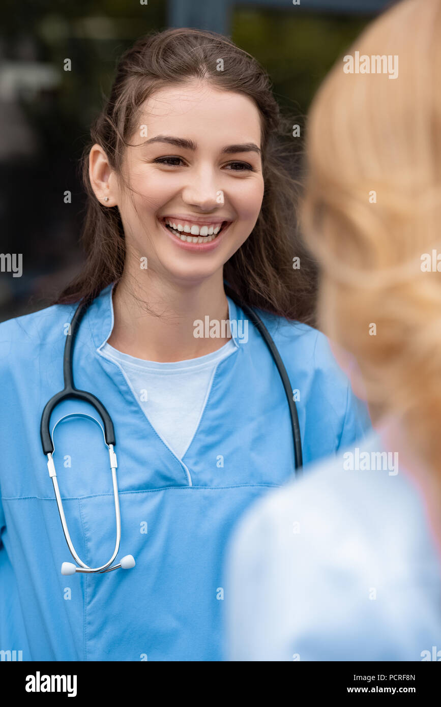 smiling medical student talking with lecturer Stock Photo - Alamy