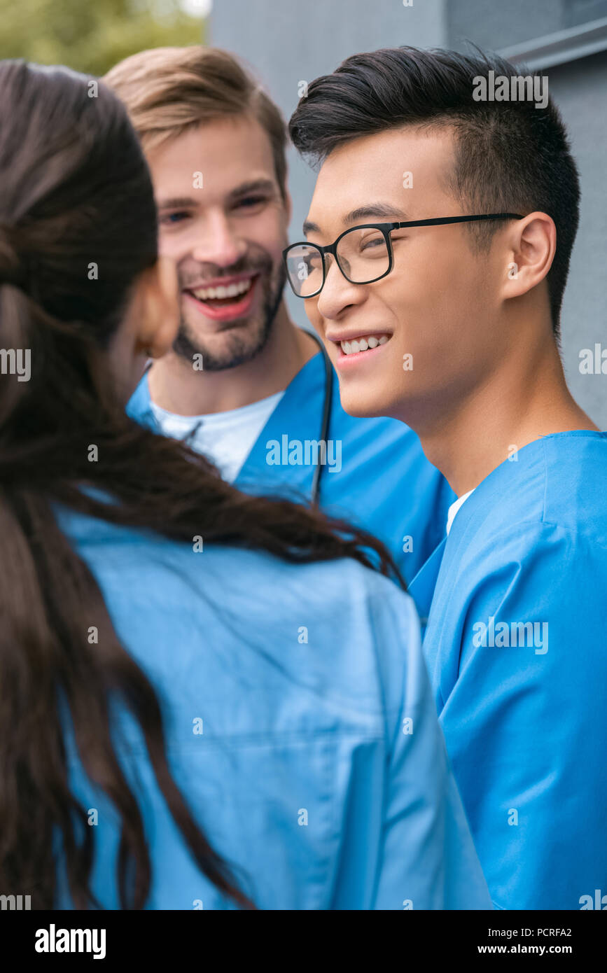 portrait of happy multicultural students in uniform Stock Photo - Alamy