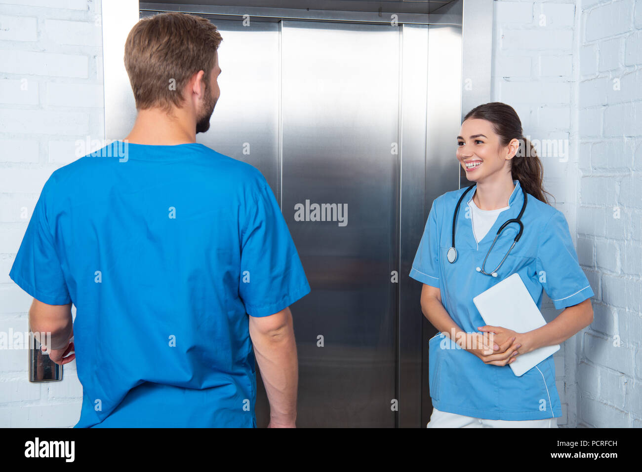 University students elevator lift hi-res stock photography and images ...