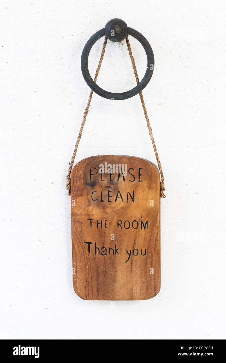 Wooden plate with sign Please clean the room Stock Photo - Alamy