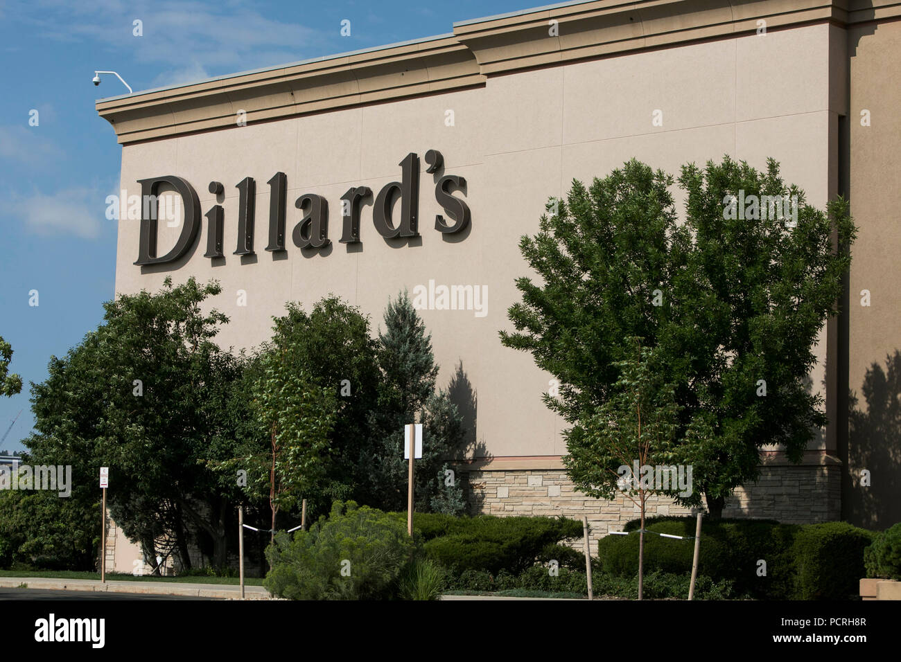 A logo sign outside of a Dillard's retail store in Broomfield, Colorado ...