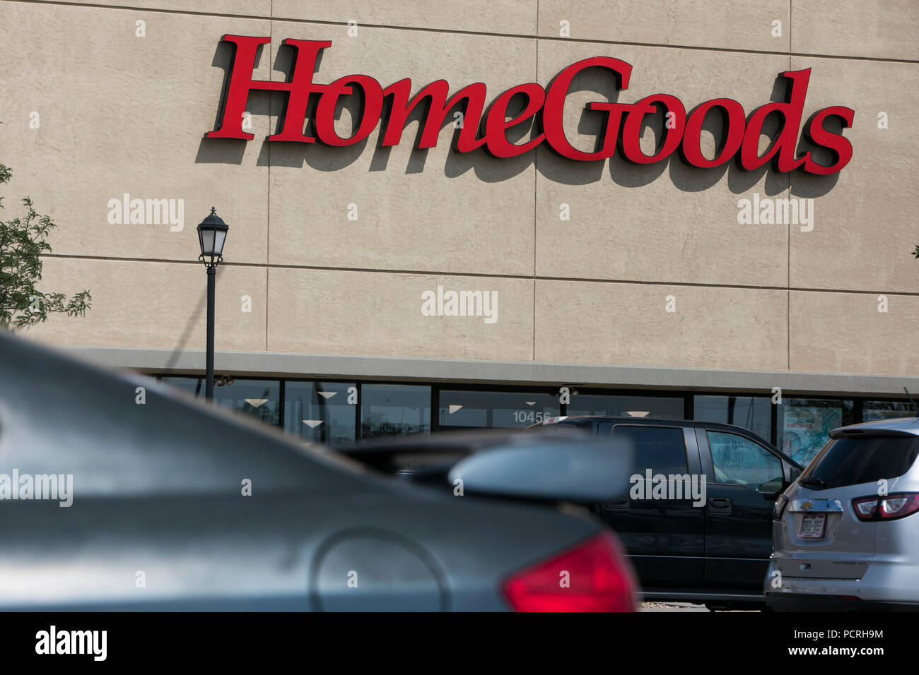 A logo sign outside of a HomeGoods retail store location in Westminster ...