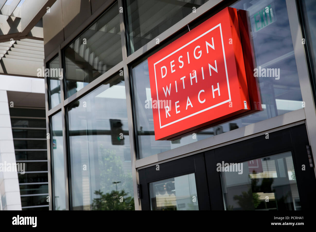 A logo sign outside of a Design Within Reach retail store location in ...
