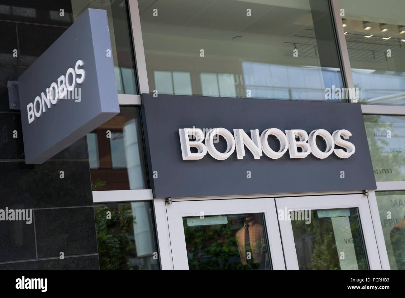 A logo sign outside of a Bonobos retail store location in Denver ...