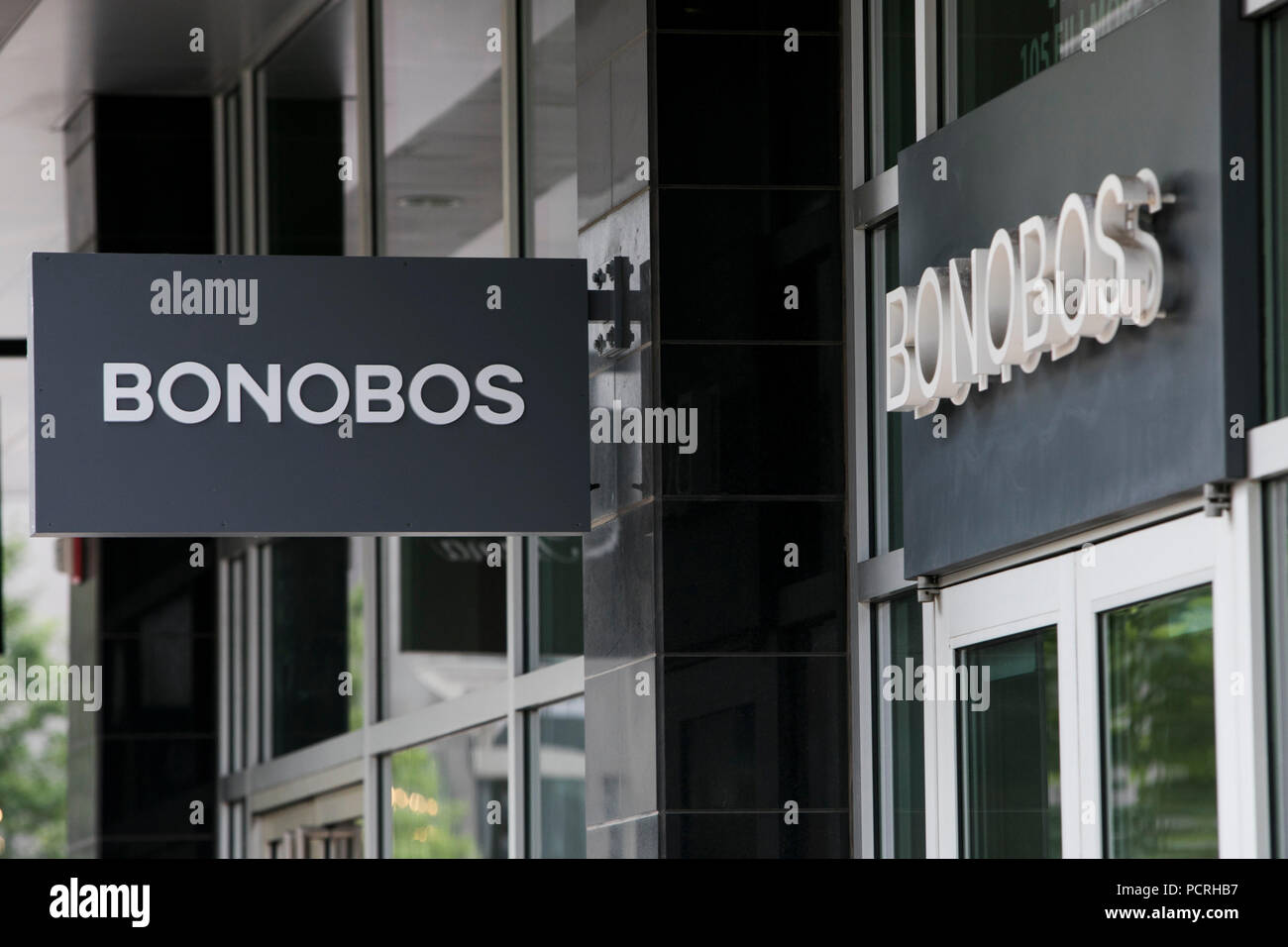 A logo sign outside of a Bonobos retail store location in Denver ...