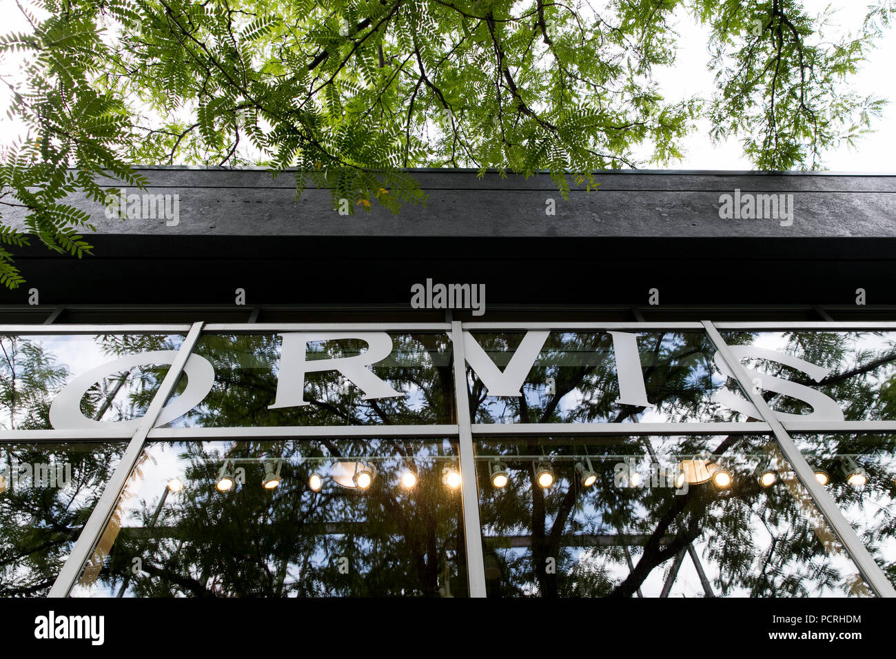 A logo sign outside of a Orvis retail store location in Denver ...