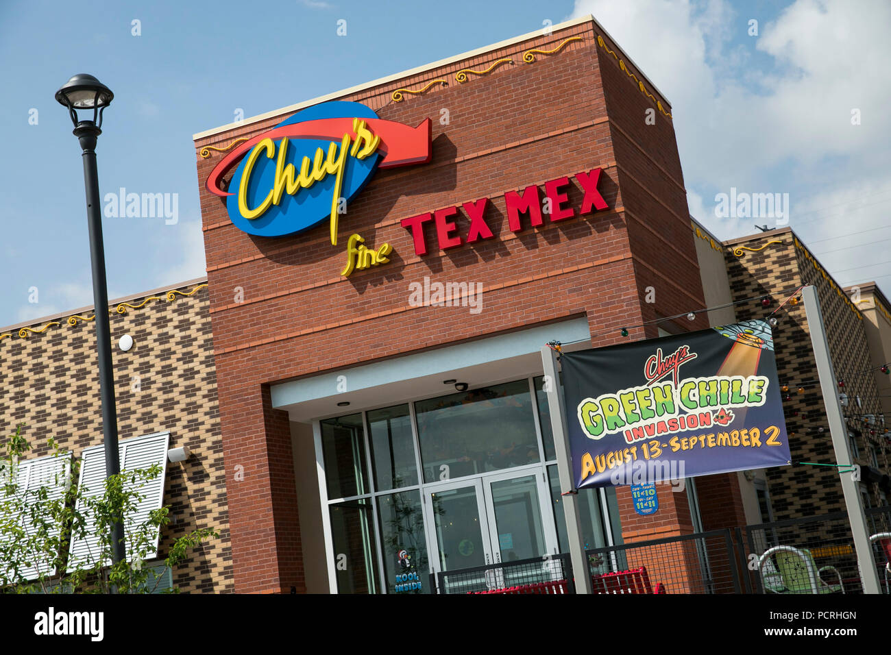 A logo sign outside of a Chuy's restaurant location in Westminster ...