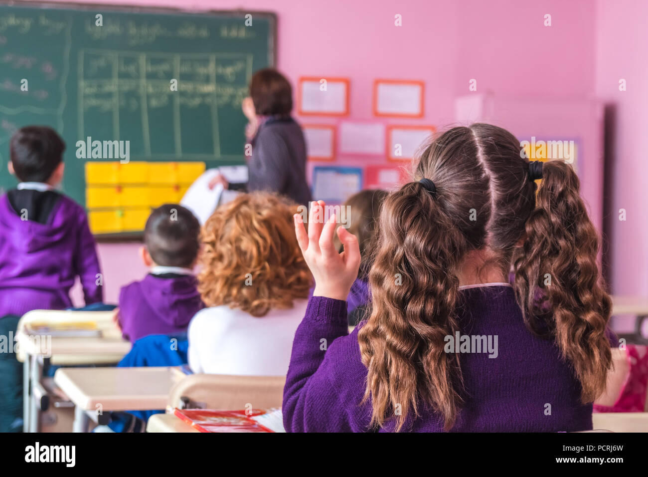 school children are participating actively in class. Education Stock ...