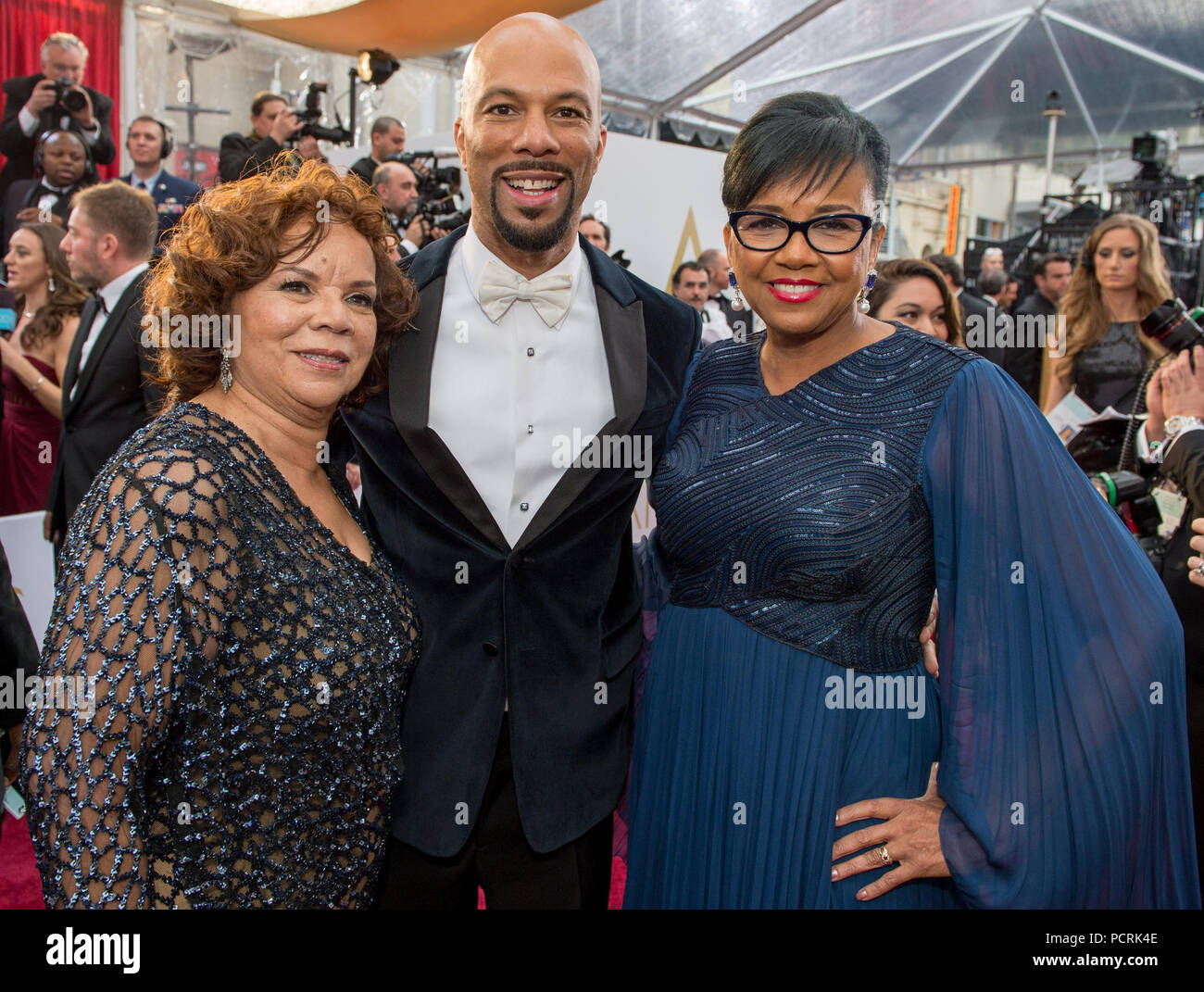 HOLLYWOOD, CA - FEBRUARY 22: Common, Lonnie Lynn, Cheryl Boone Isaacs ...