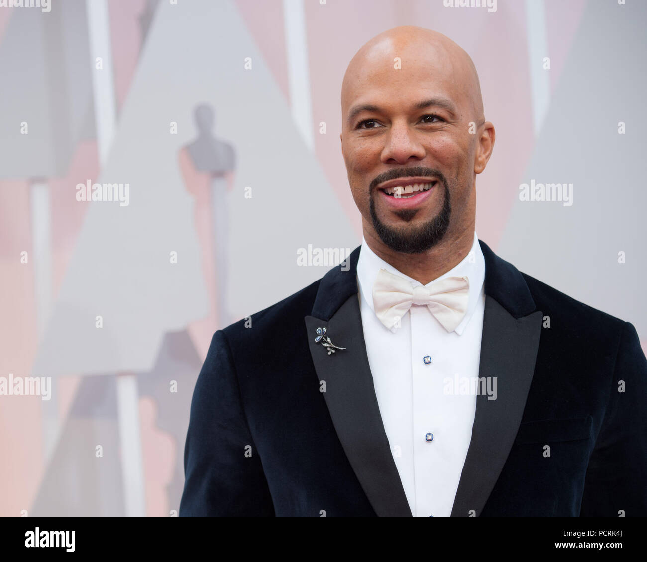 HOLLYWOOD, CA - FEBRUARY 22: Common, Lonnie Lynn arrives at the 87th ...