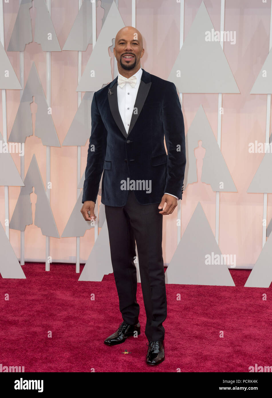 HOLLYWOOD, CA - FEBRUARY 22: Common, Lonnie Lynn arrives at the 87th ...