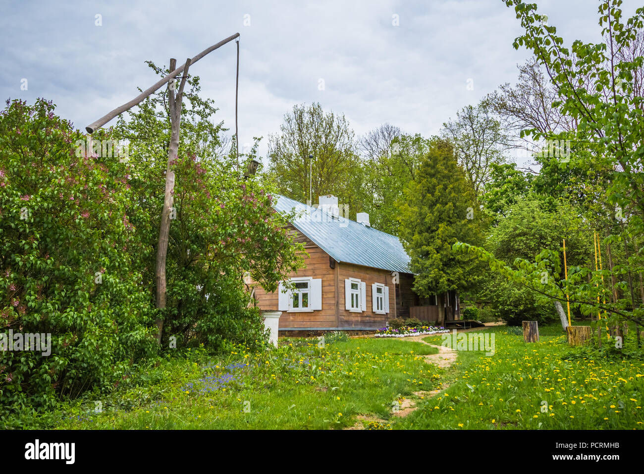 Old house behind tree hi-res stock photography and images - Alamy