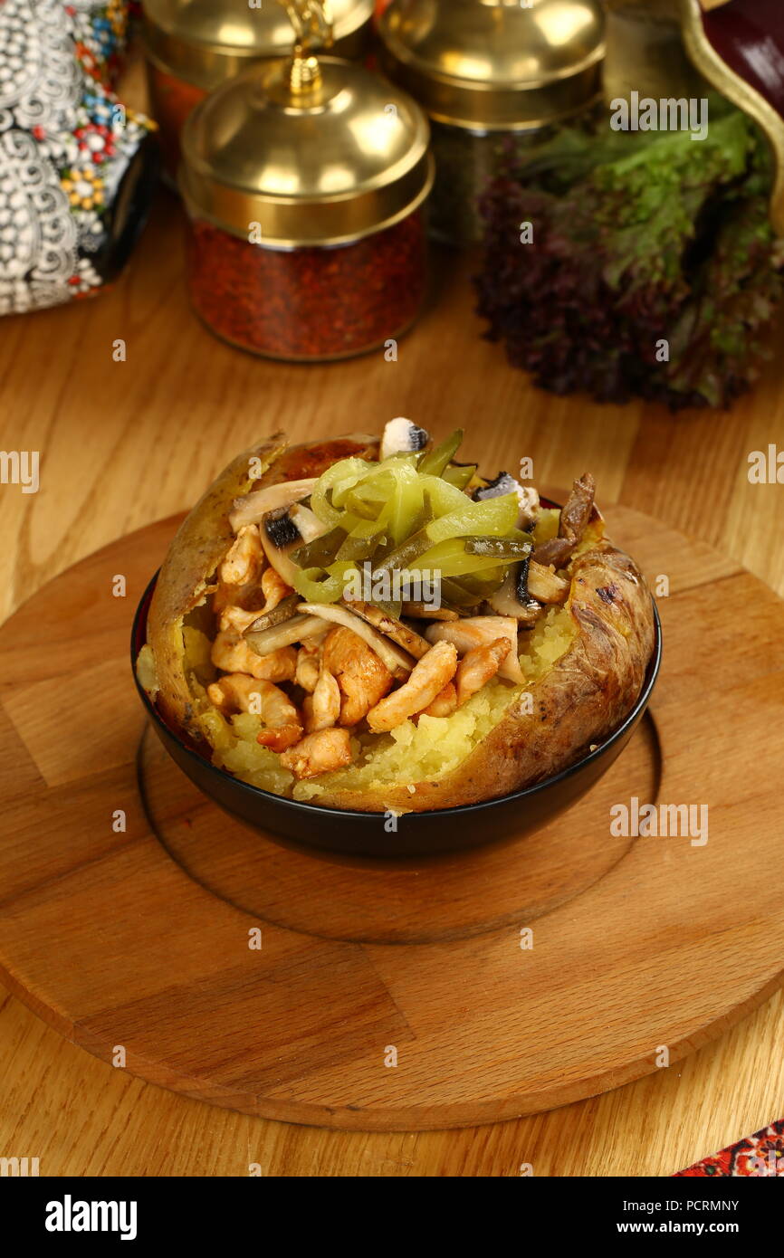 Kumpir / Turkish Baked potato with chicken meat Stock Photo - Alamy