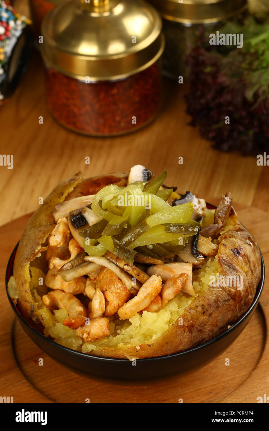 Kumpir / Turkish Baked potato with chicken meat Stock Photo - Alamy