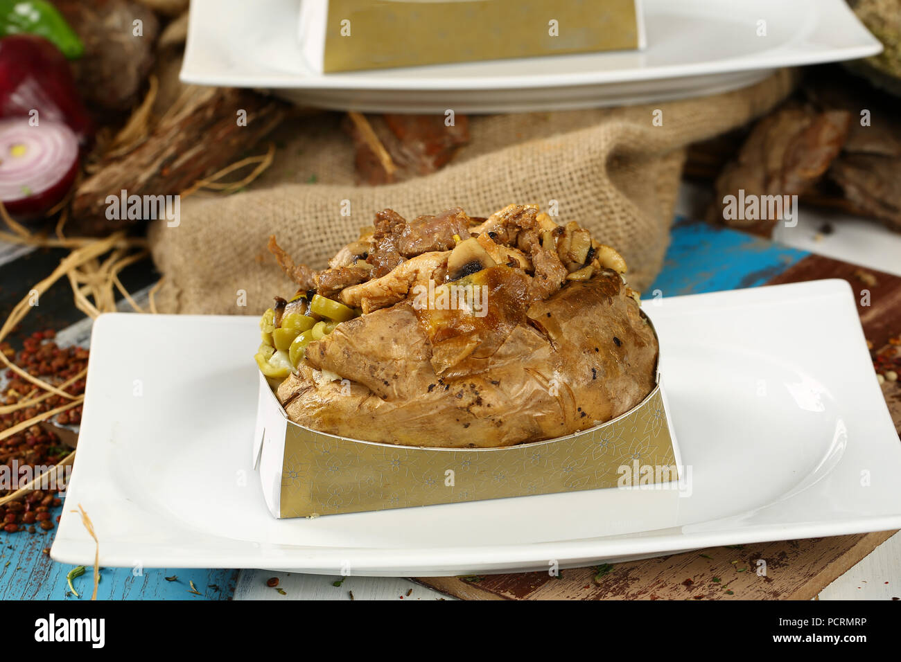 Kumpir / Turkish Baked potato with chicken meat Stock Photo - Alamy