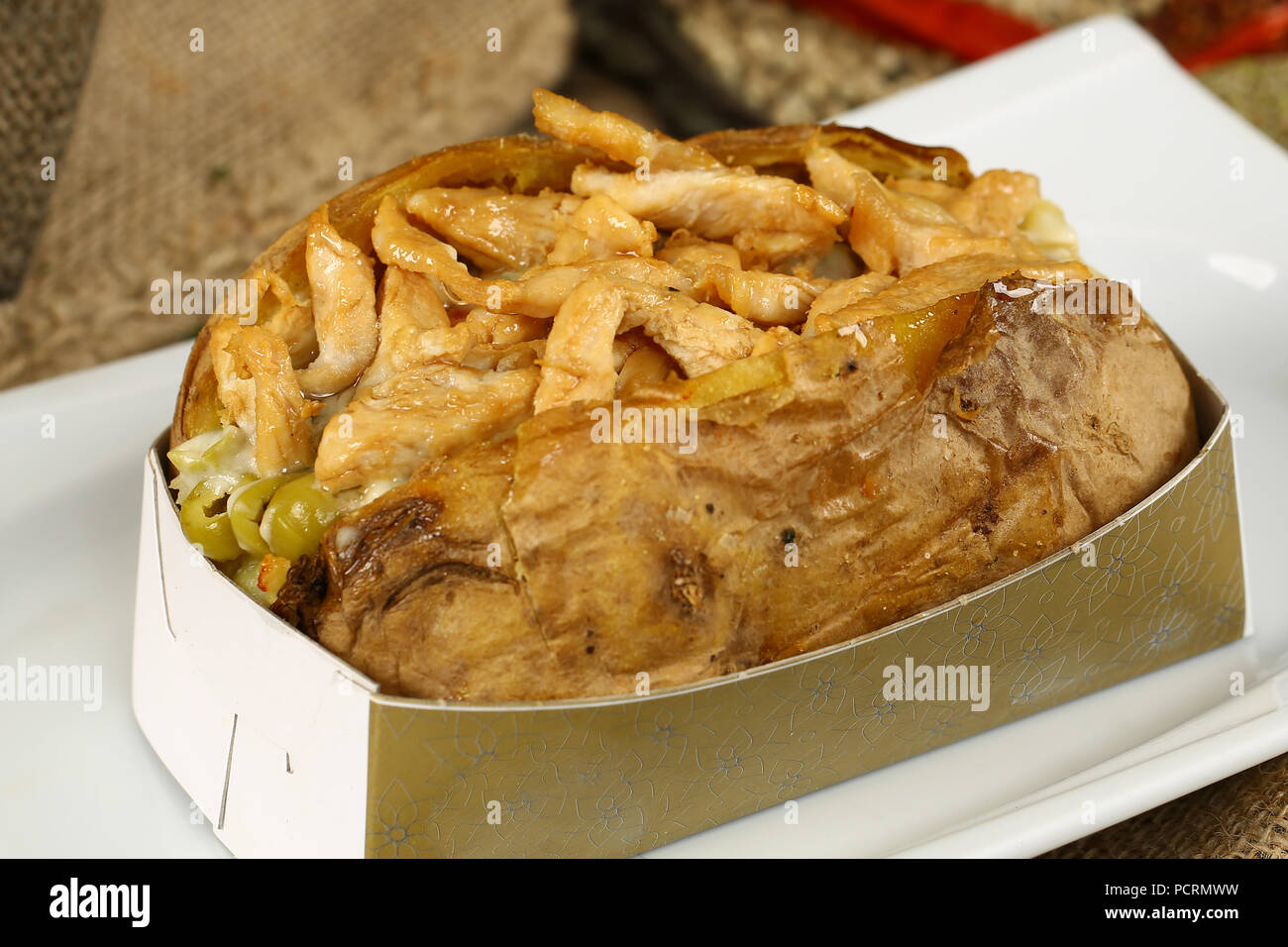 Kumpir / Turkish Baked potato with chicken meat Stock Photo - Alamy