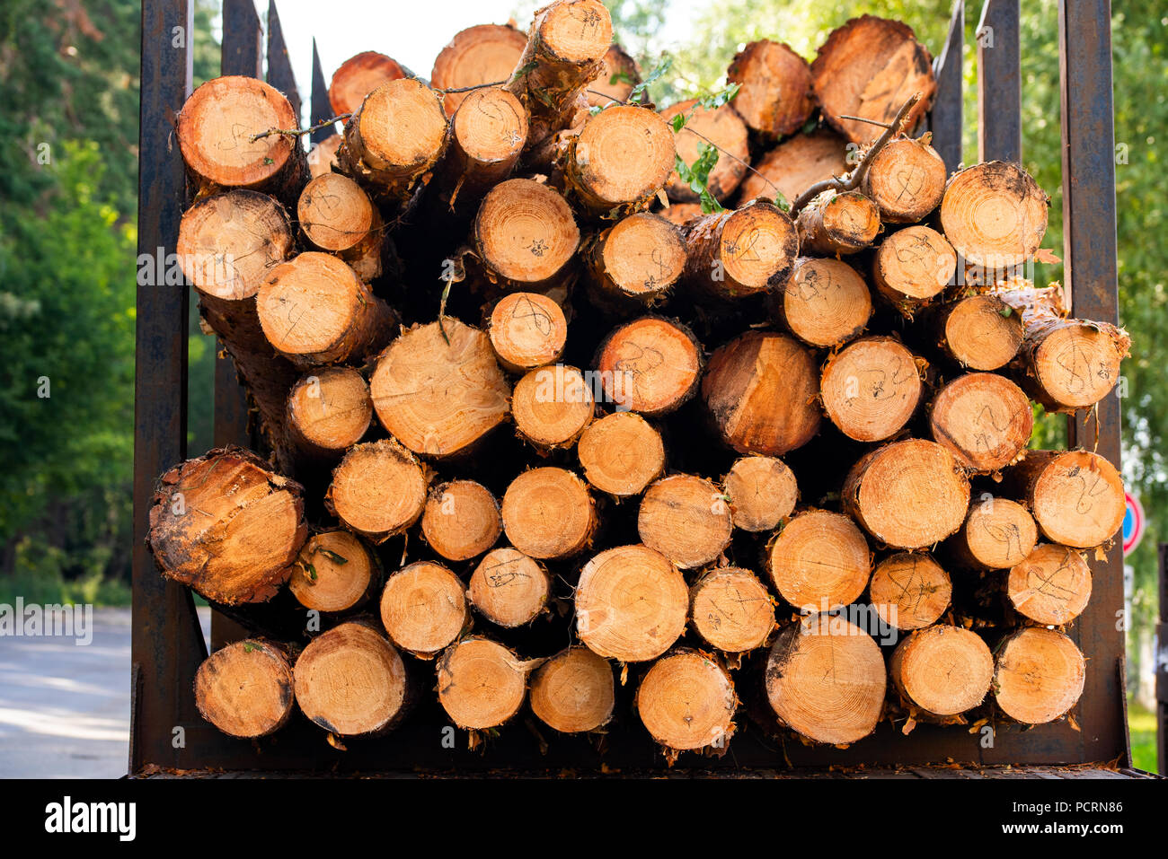 piled timber for a lorry Stock Photo - Alamy