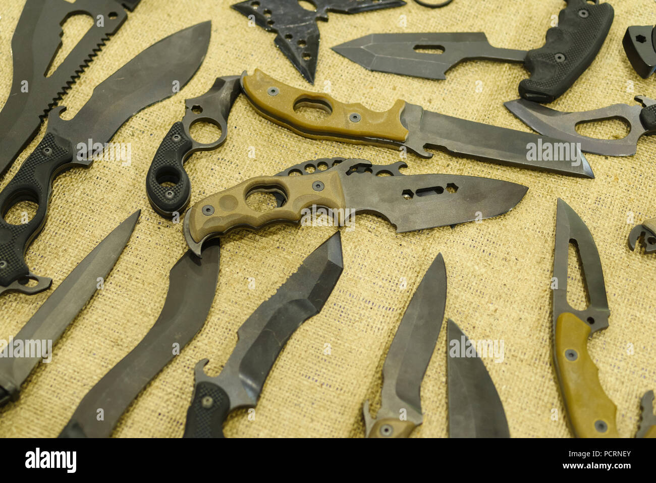 metal knives for protection and attacks on the table Stock Photo - Alamy