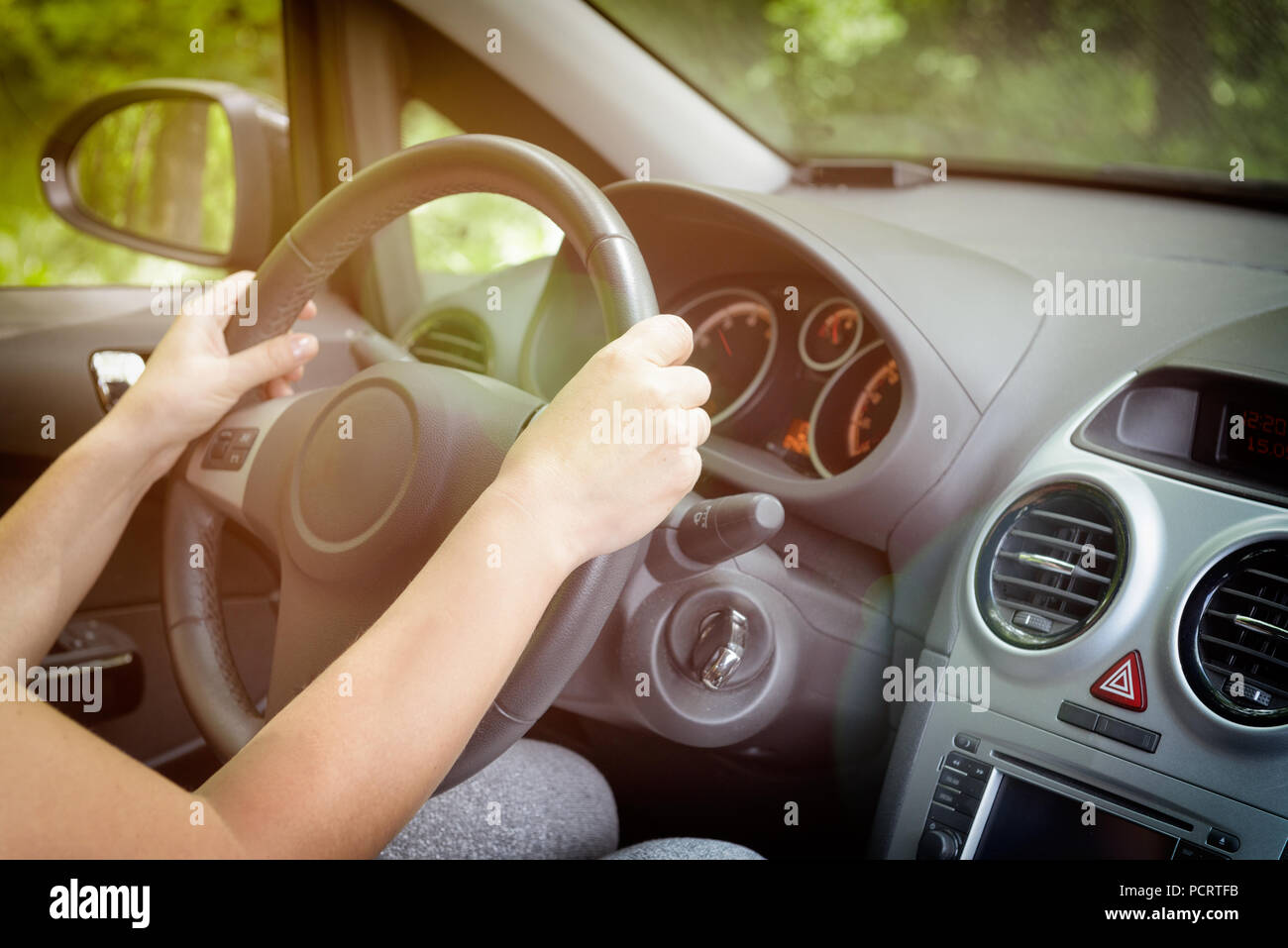 Woman drive car from behind hi-res stock photography and images - Alamy