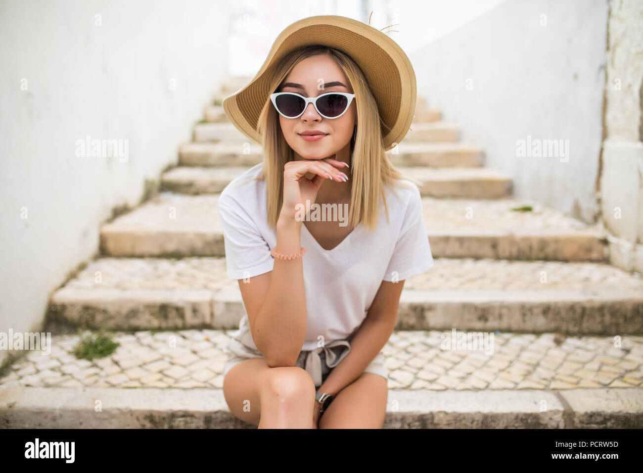 Beautiful Young Caucasian Woman Smiling In Urban Background Blond Girl