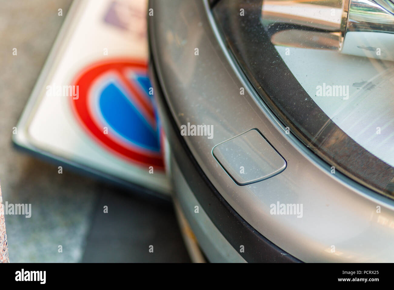 Parking sign for handicapped people hit by a car Stock Photo - Alamy