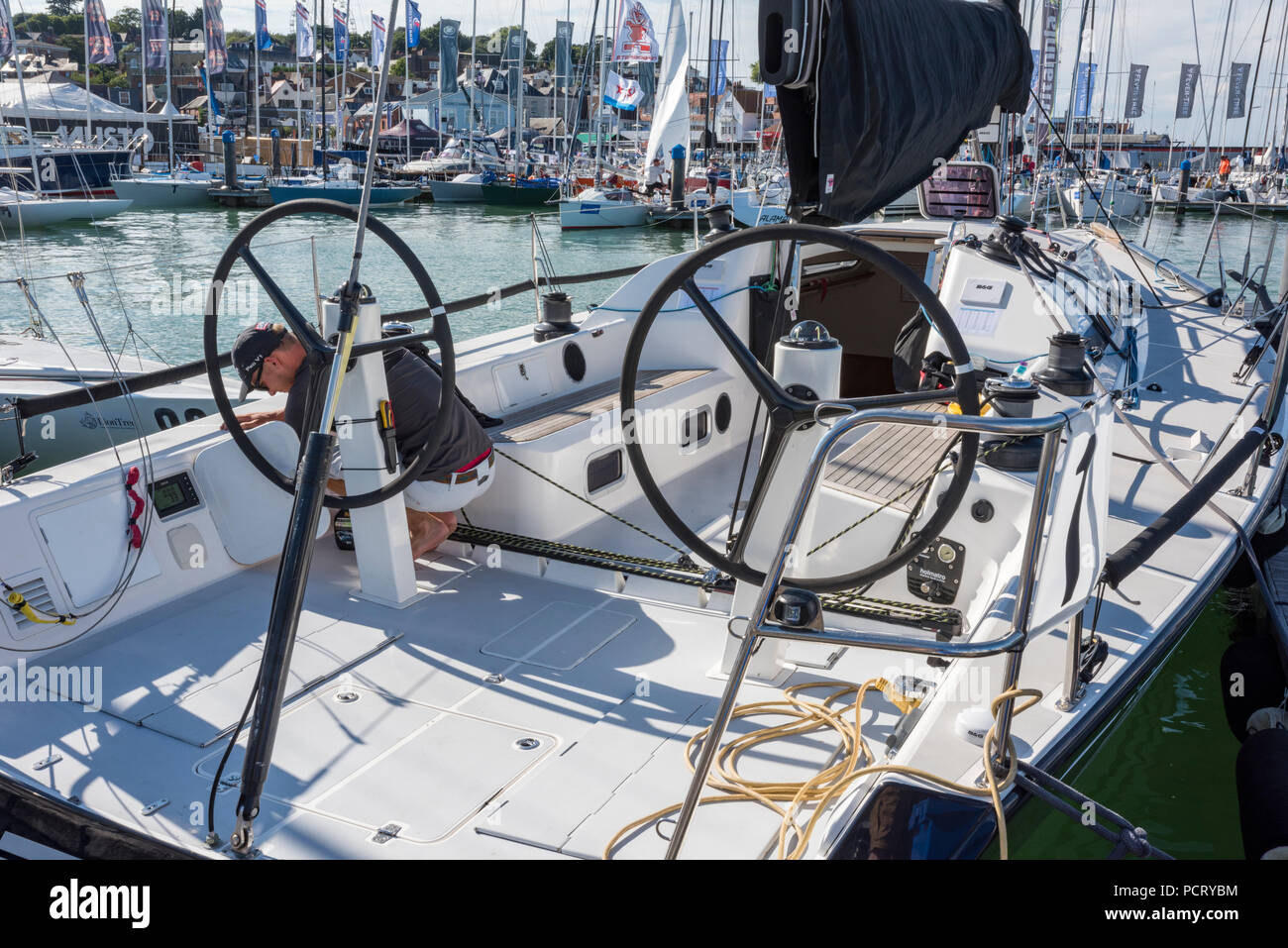 large racing yacht with twin helms and steering wheels in the yacht ...
