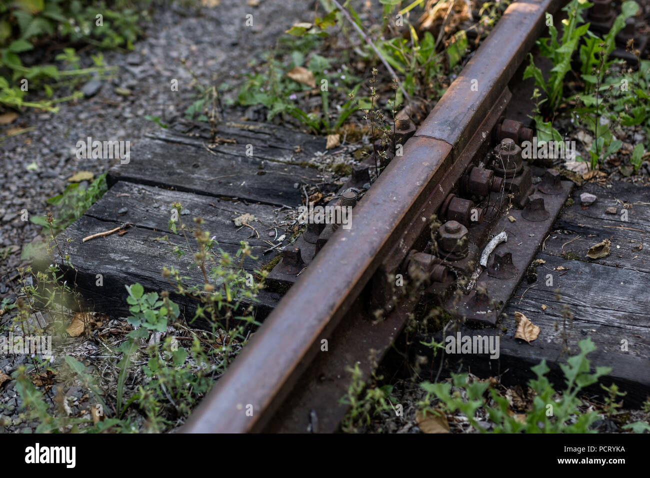 Old railway rails. Connecting railway rails in old technology. Season ...