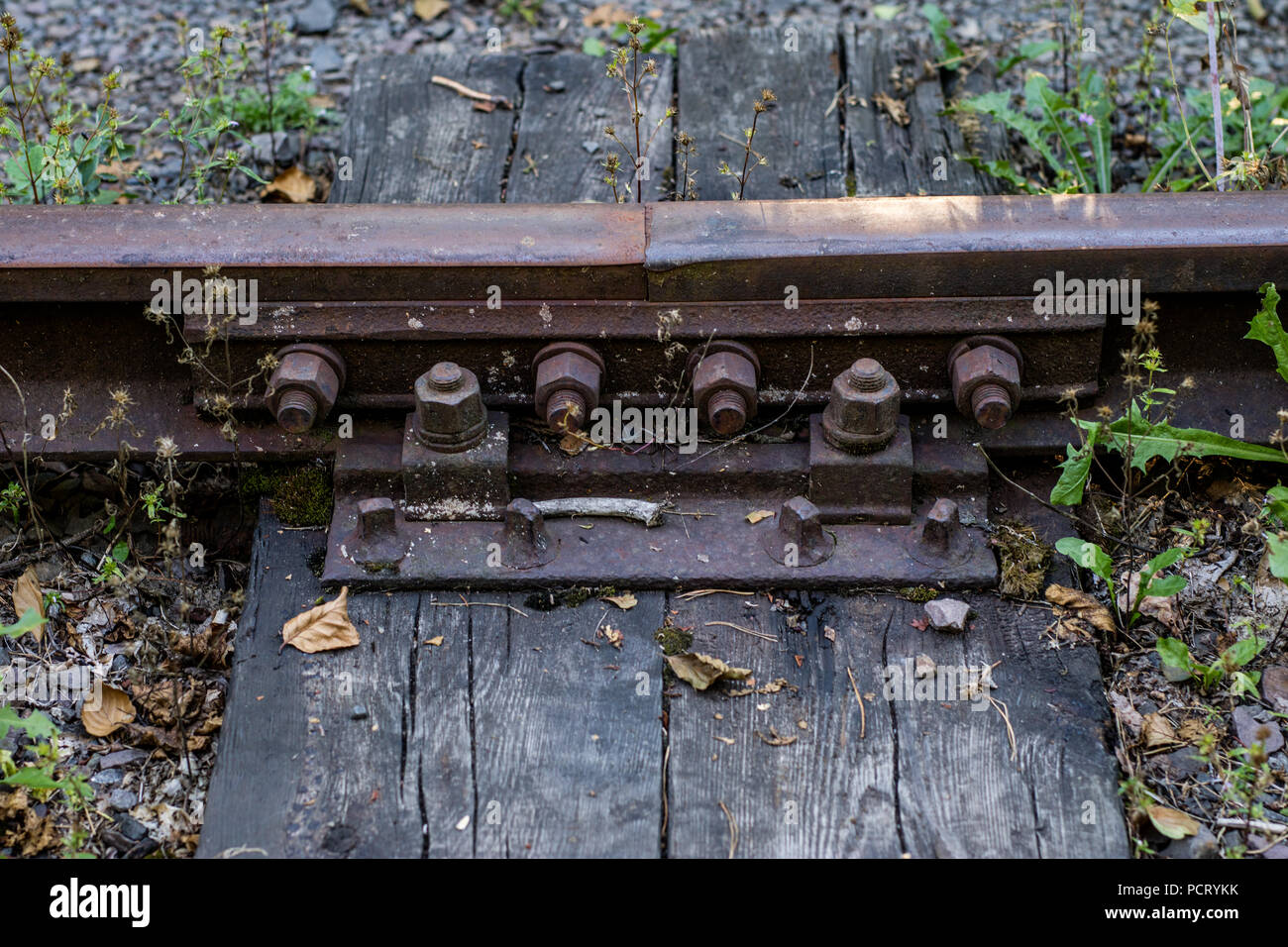 Old railway rails. Connecting railway rails in old technology. Season ...