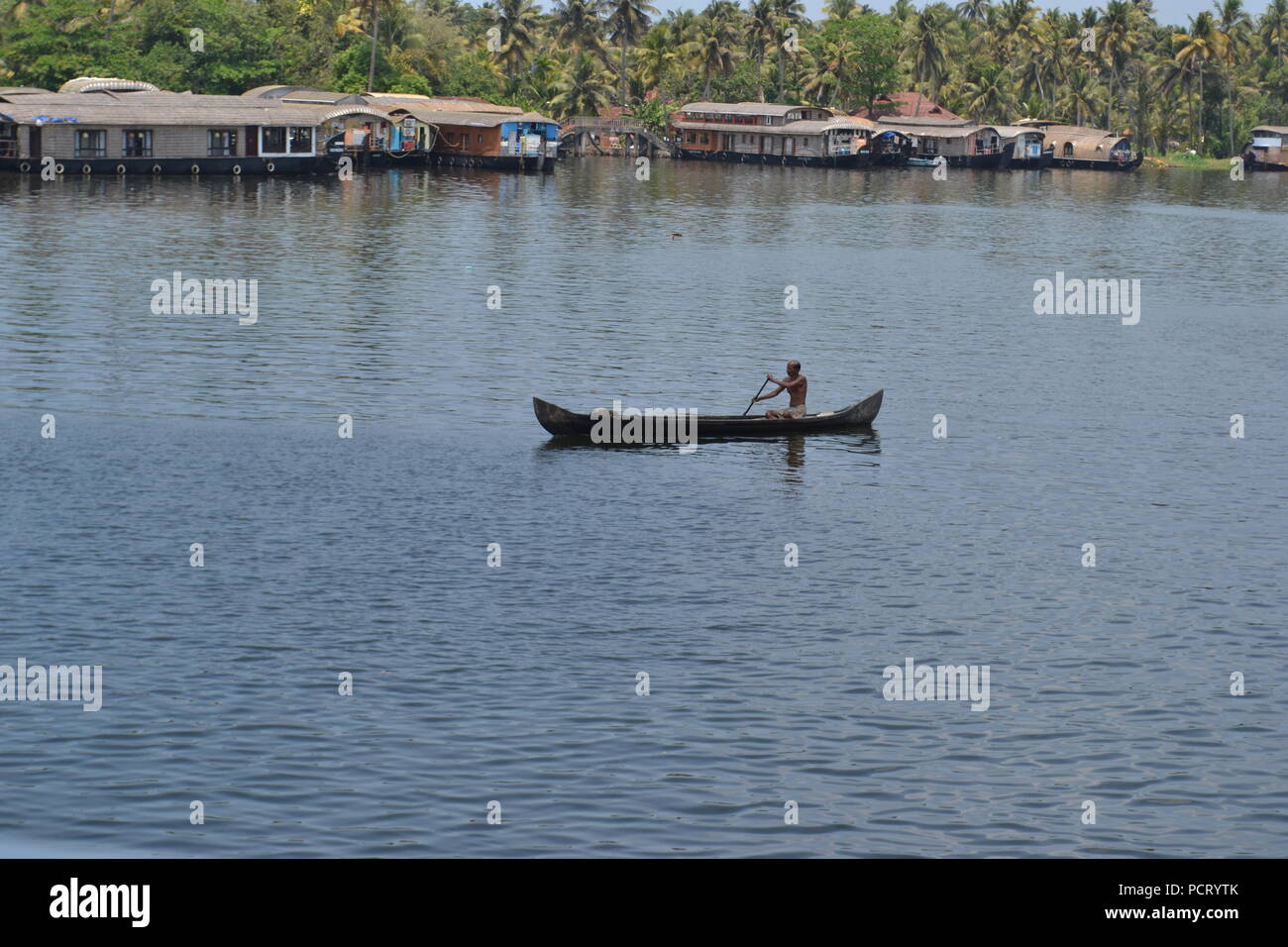 A man roving boat in Kerala Stock Photo - Alamy