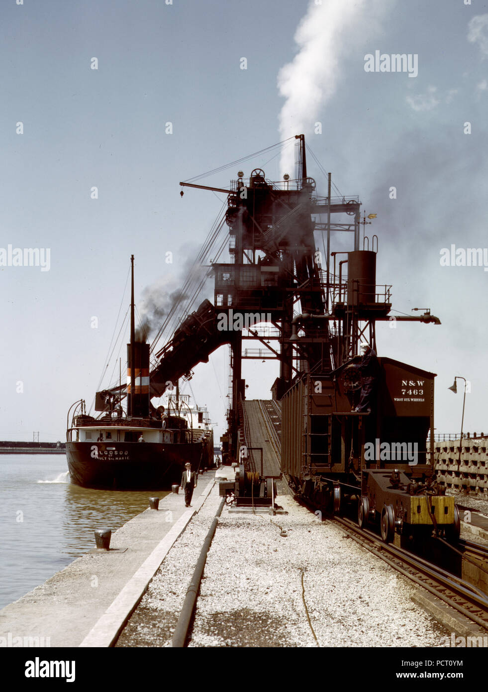 Loading a lake freighter with coal at the Pennsylvania R.R. coal docks ...
