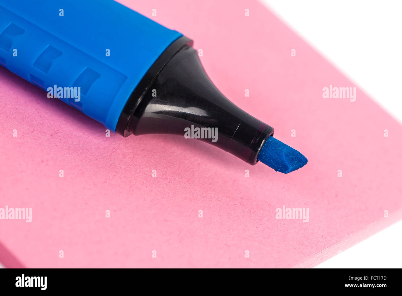Blue marker and paper on a white background Stock Photo - Alamy