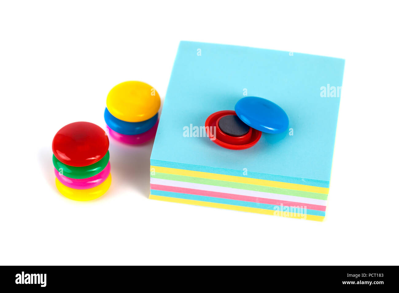 Colorful magnets - holders and papers on a white background Stock Photo ...