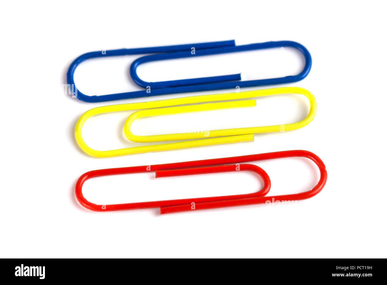 Colorful paper clips isolated on white background Stock Photo - Alamy