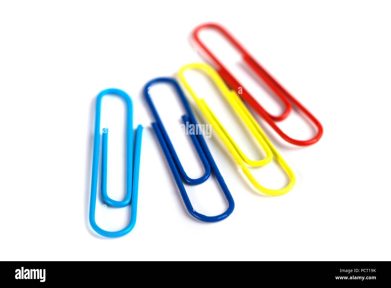 Colorful paper clips isolated on white background Stock Photo - Alamy