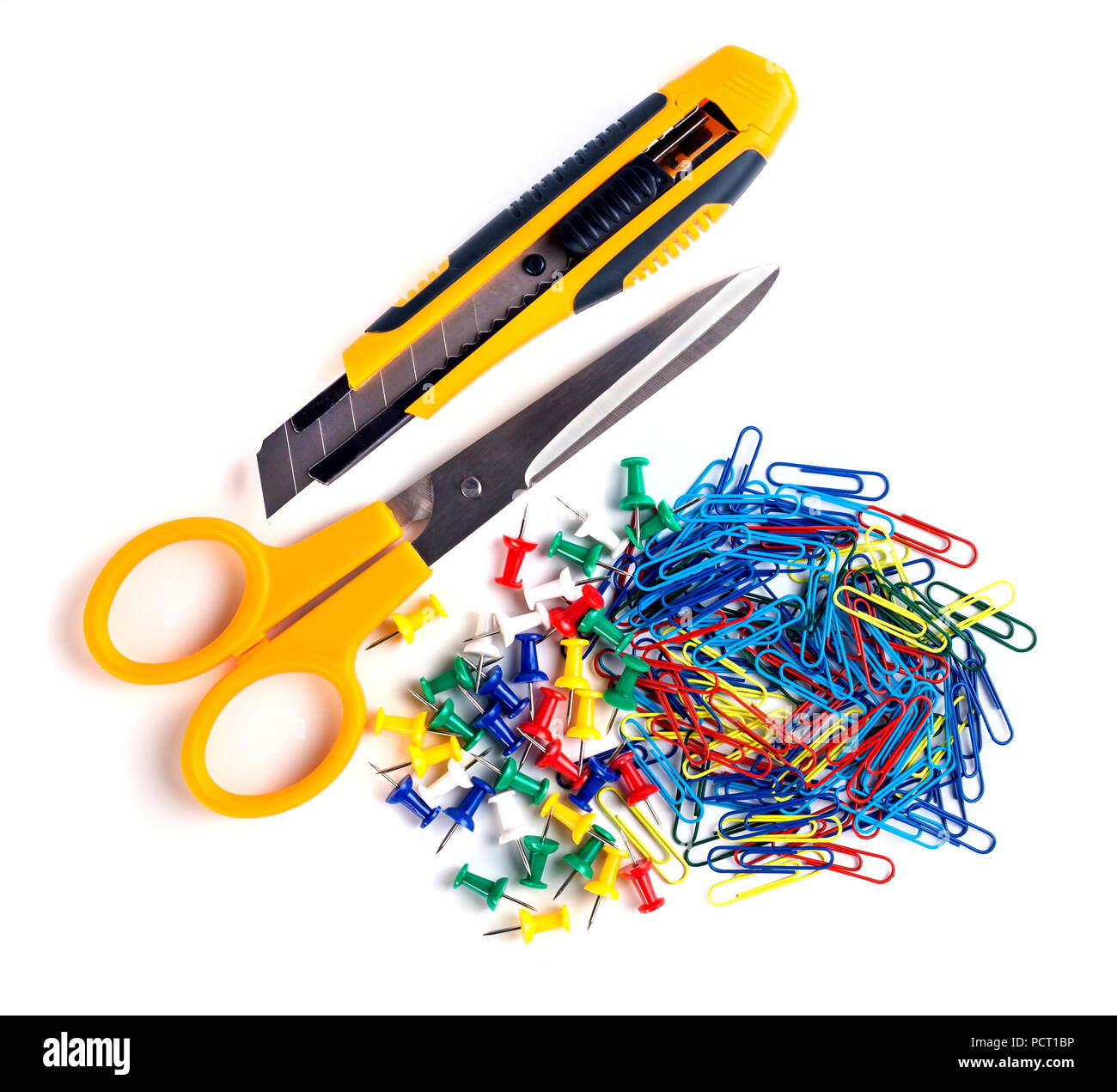 Scissor, tacks and paper clips on white background Stock Photo - Alamy