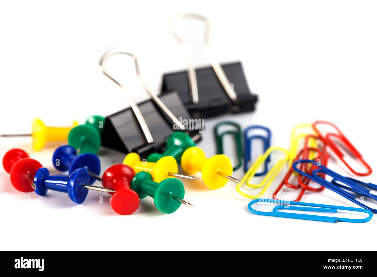 Scissor, tacks and paper clips on white background Stock Photo - Alamy