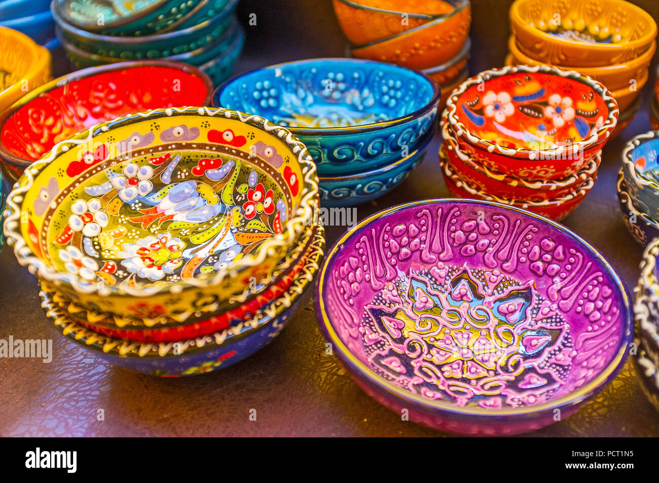 Traditional Turkish dishware with fine relief patterns on floral themes ...