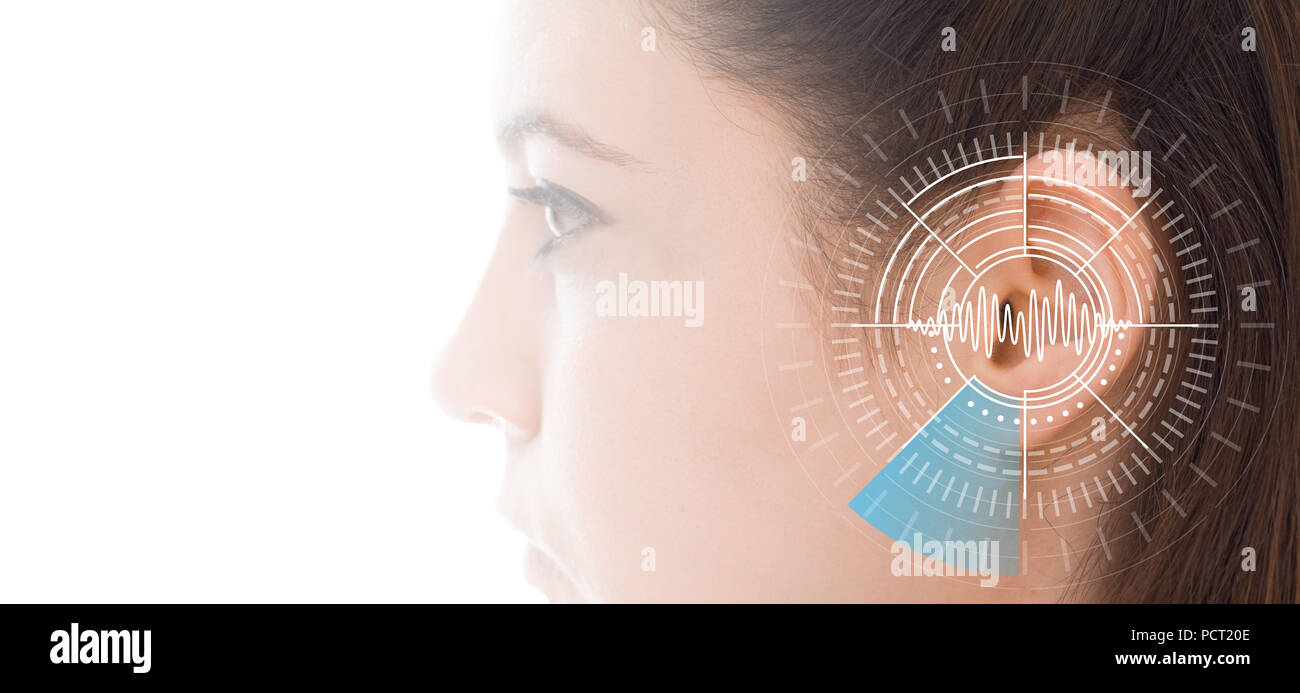 Hearing test showing ear of young woman with sound waves simulation ...