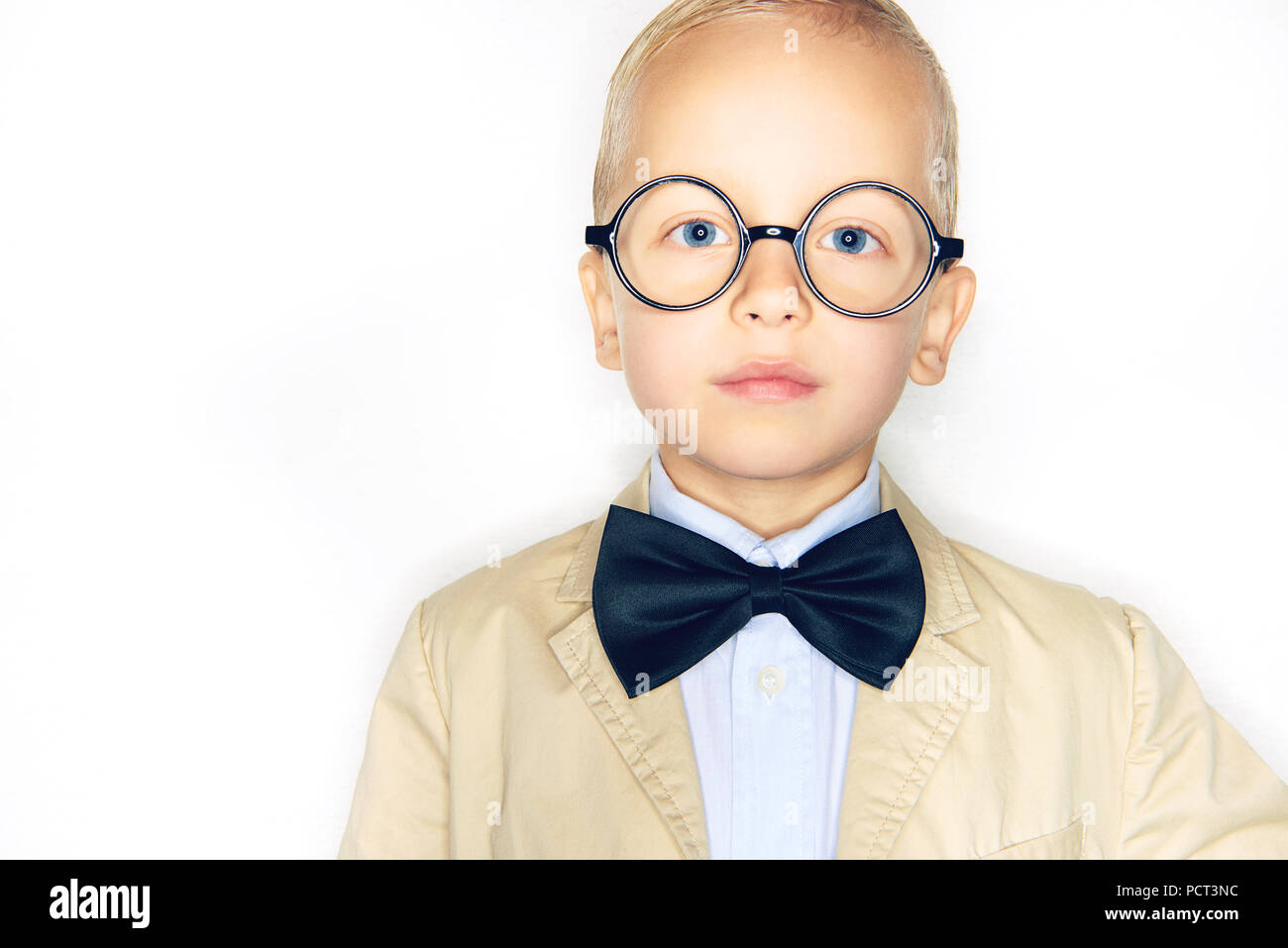 Adorable little blonde boy dressed like a professor wearing glasses, a ...