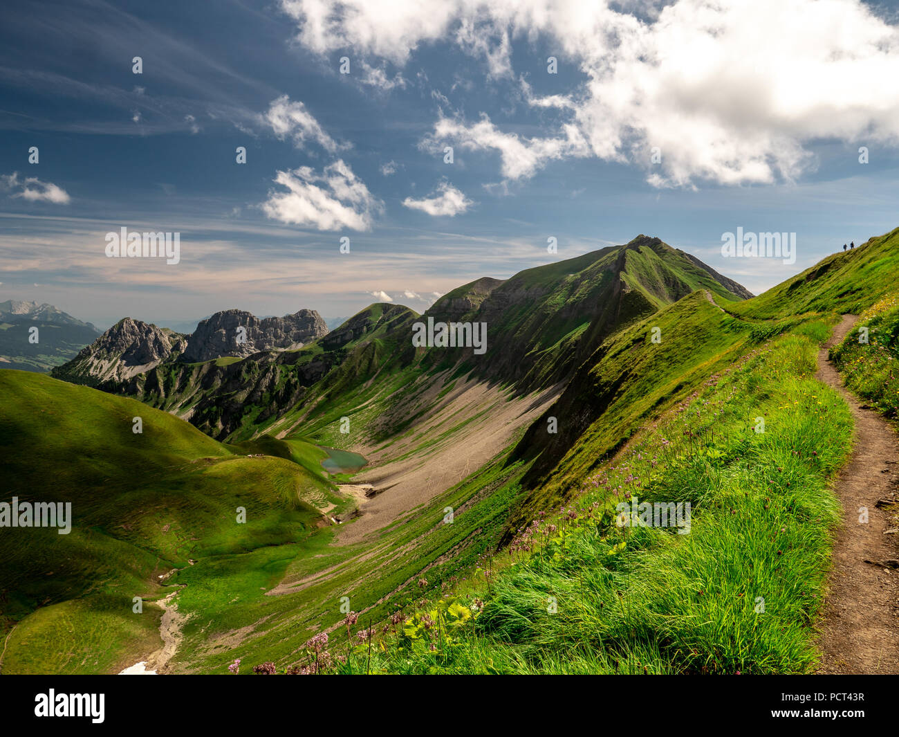 scary hiking path with beautiful scenery view over the swiss alps and ...