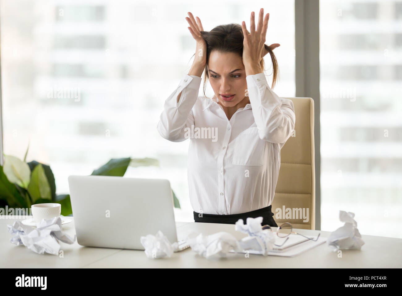 Stressed female worker panicking unable to finish work till dead Stock ...