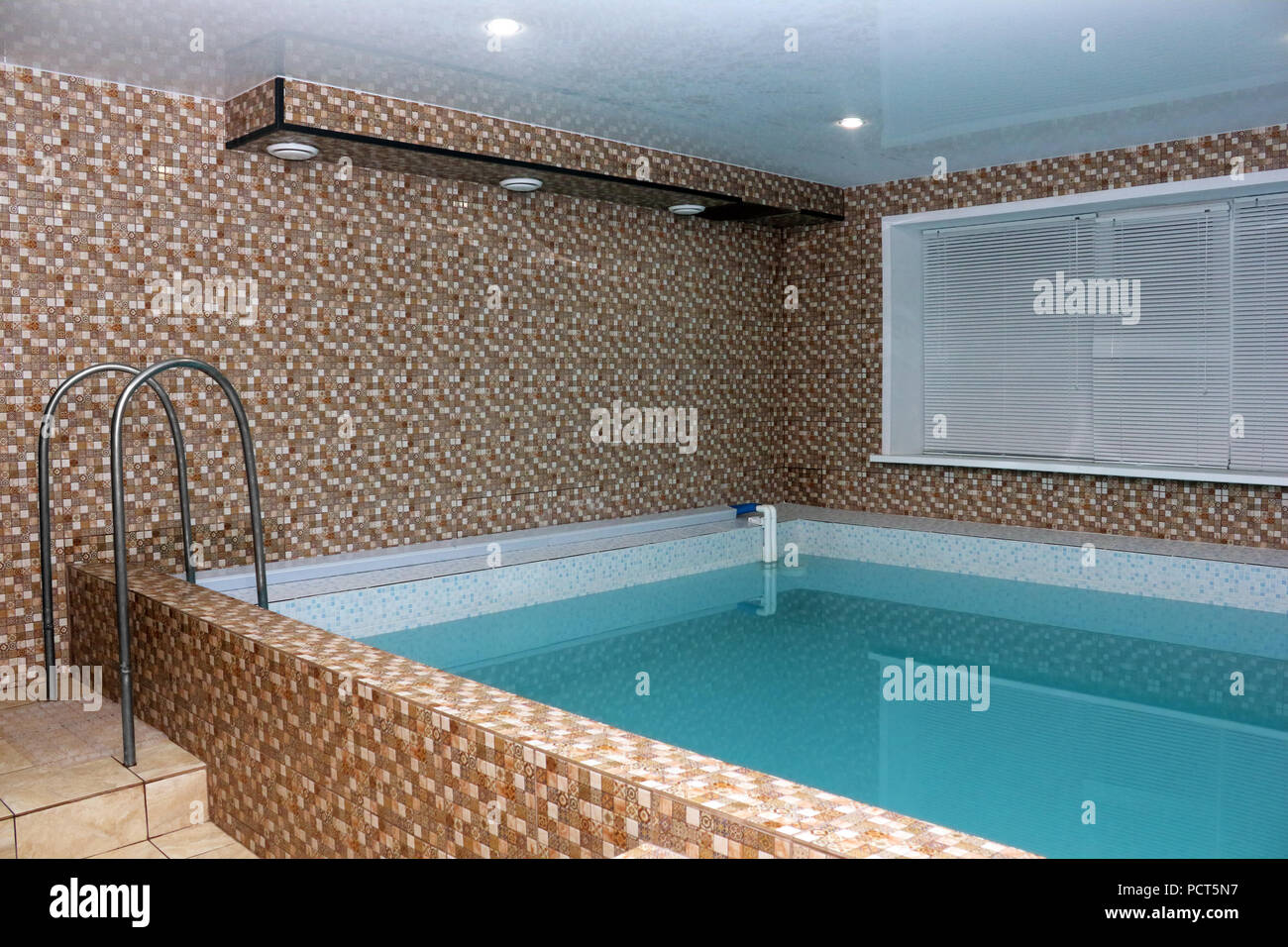 Sauna pool with blue water interior photo Stock Photo - Alamy