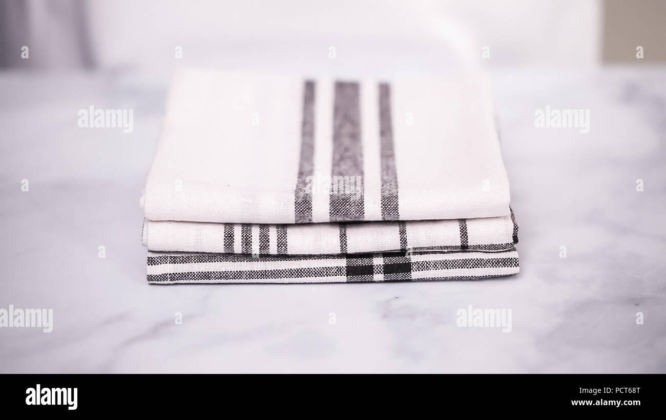 Folding Blck and white patterned paper towels on marble surface Stock ...