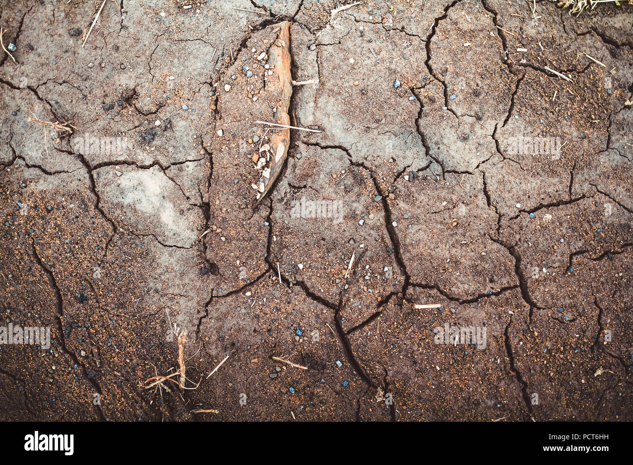 the texture of an orange clay with cracks background Stock Photo - Alamy